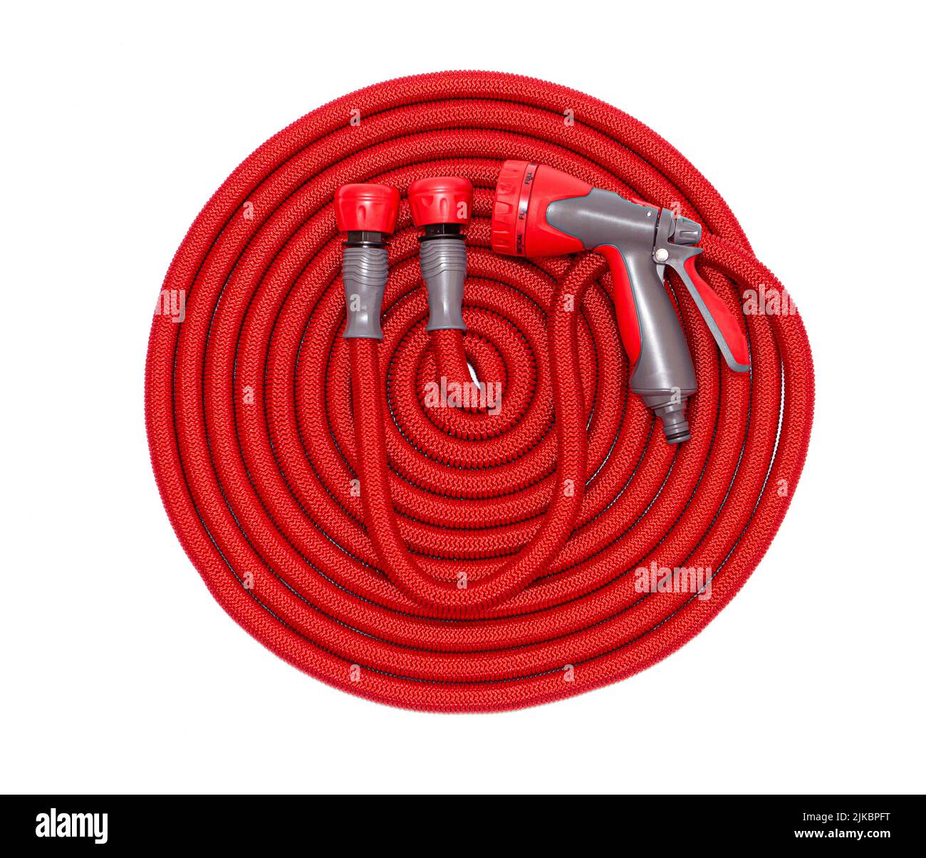Red garden hose with a sprayer isolated on a white background Stock ...