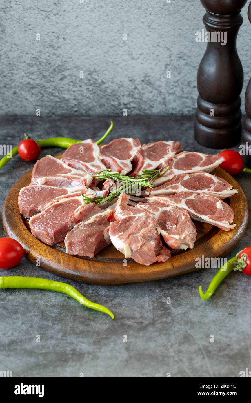 Lamb chops. Rib chop on dark background. Butcher products. close up ...