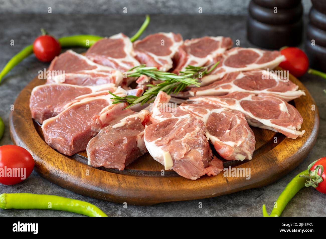 Lamb chops. Rib chop on dark background. Butcher products. close up ...