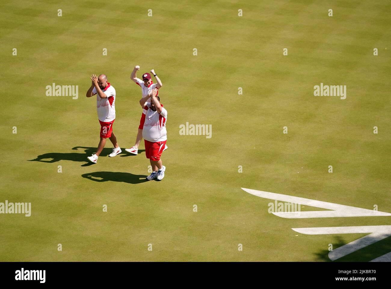 England's Nick Brett, Louis Ridout and Jamie Chestney celebrate winning ...