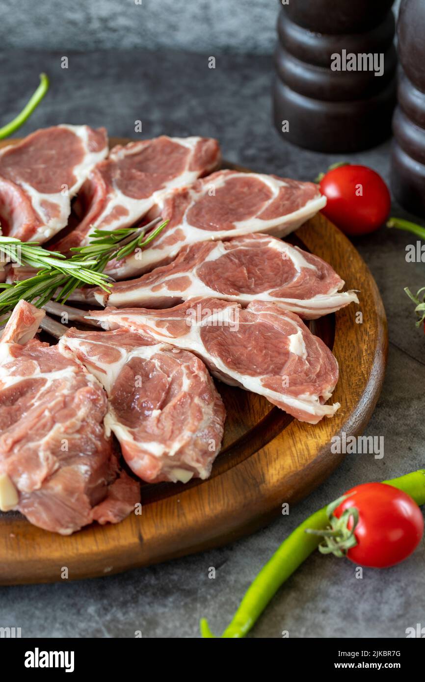 Lamb chops. Rib chop on dark background. Butcher products. close up ...