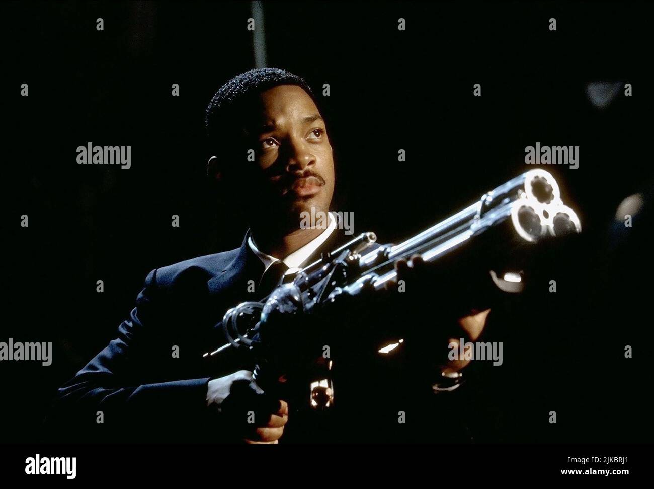 Men in black film, gun hi-res stock photography and images - Alamy