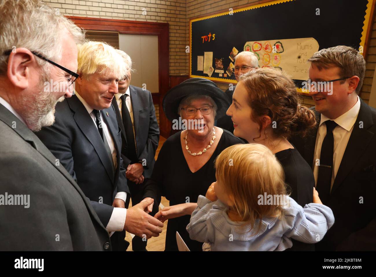 (left to right) UUP leader Doug Beattie, Prime Minister Boris Johnson ...