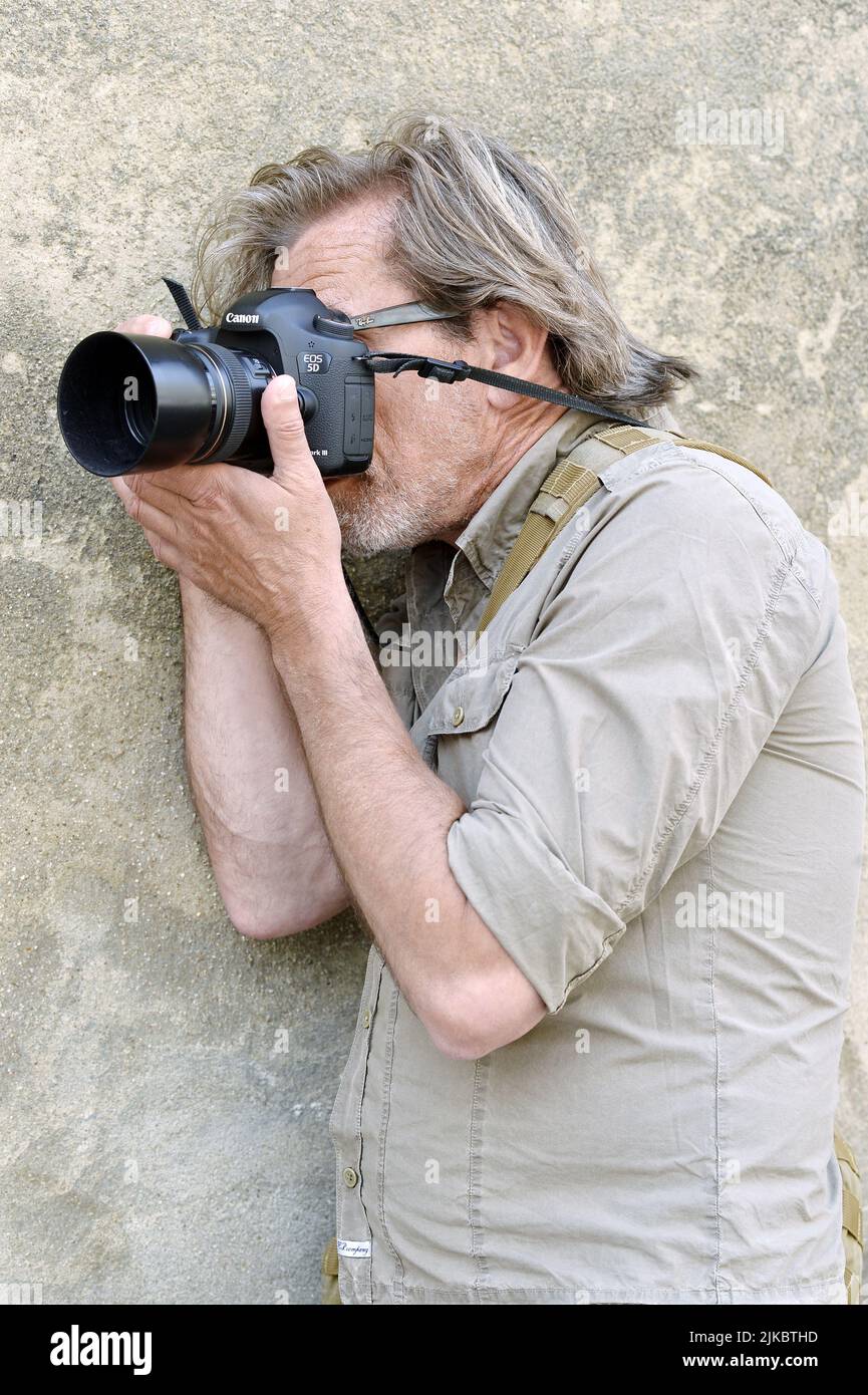 Woman taking photo canon camera hi-res stock photography and images - Alamy