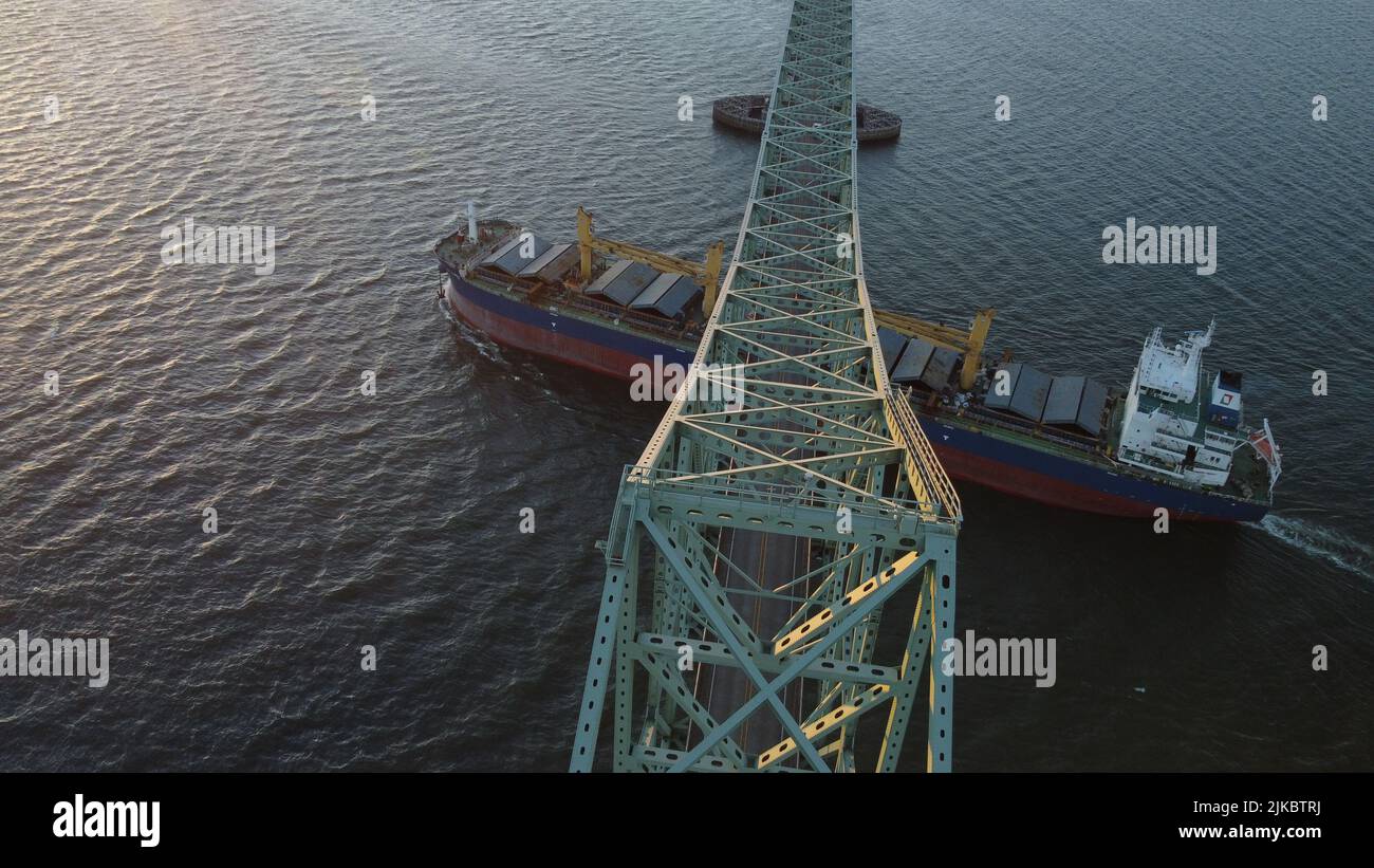 An aerial view of a freight ship sailing under the Columbia River ...