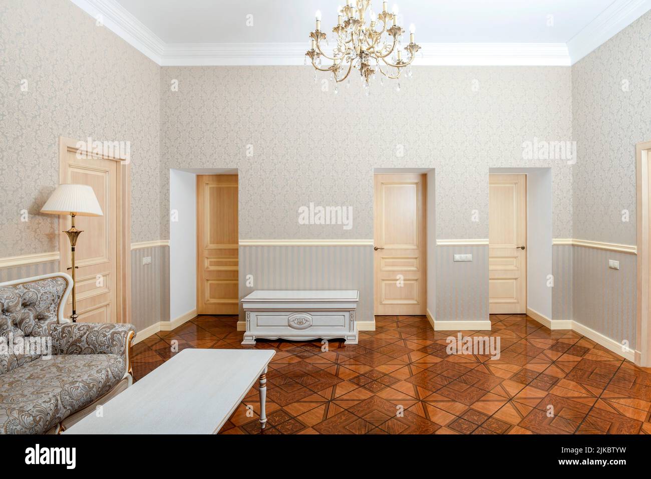 Spacious hall for guests in the house. Wooden lacquered floor and ...