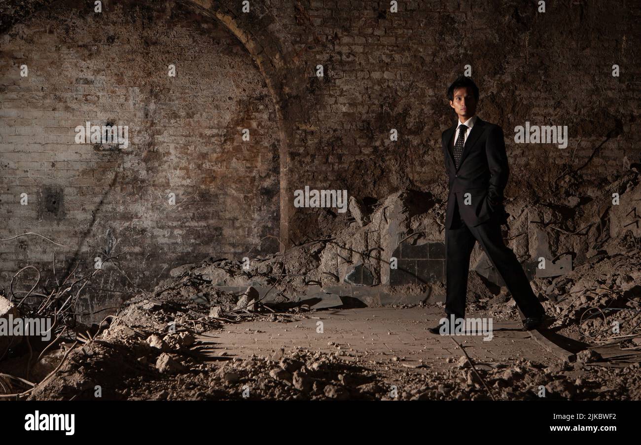 Chinese businessman fallen hi-res stock photography and images - Alamy