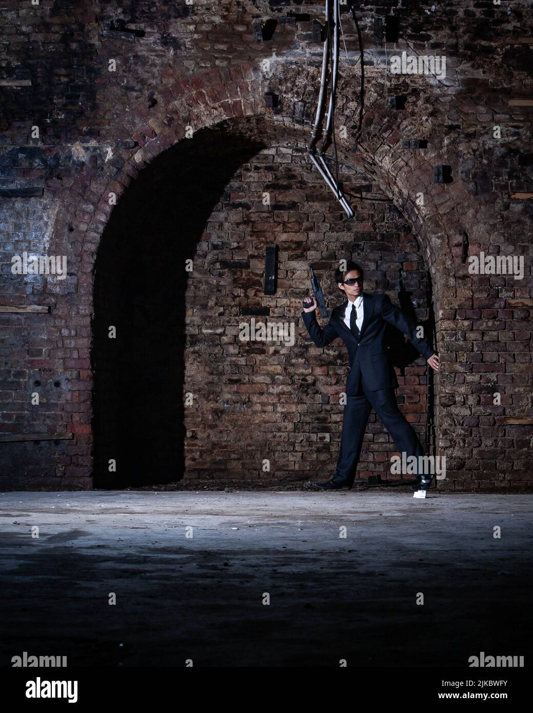 Chinese man with a gun hi-res stock photography and images - Alamy