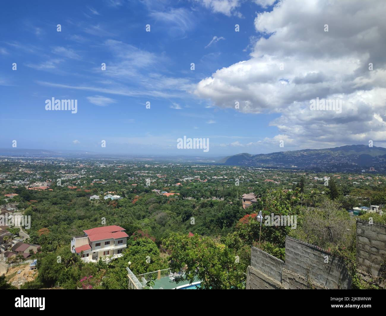 An Overview Of A Part Of Kingston City With Cloudy Sky In Jamaica Stock