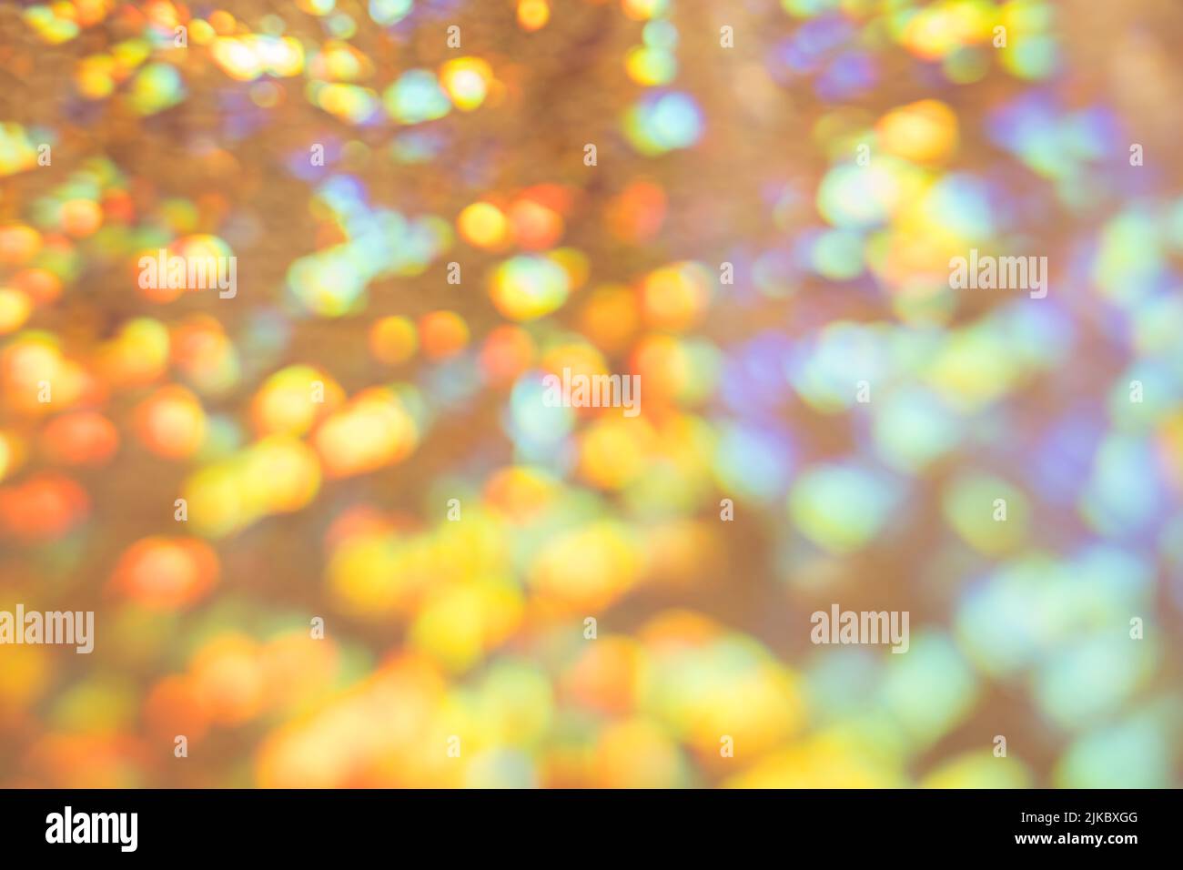 golden lens flare glow festive firework background Stock Photo - Alamy