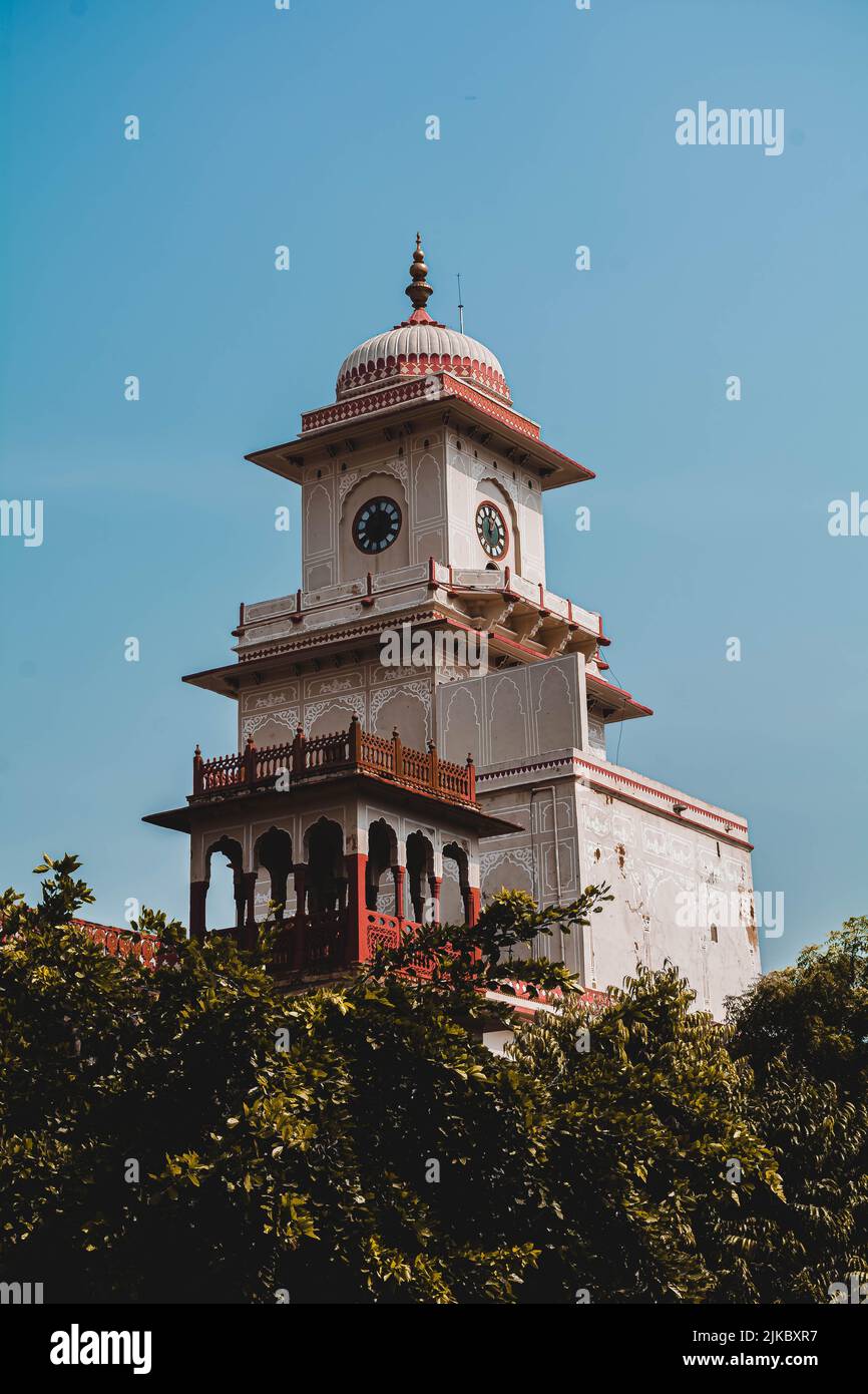 A vertical shot of the clock tower of City Palace, Jaipur Stock Photo ...