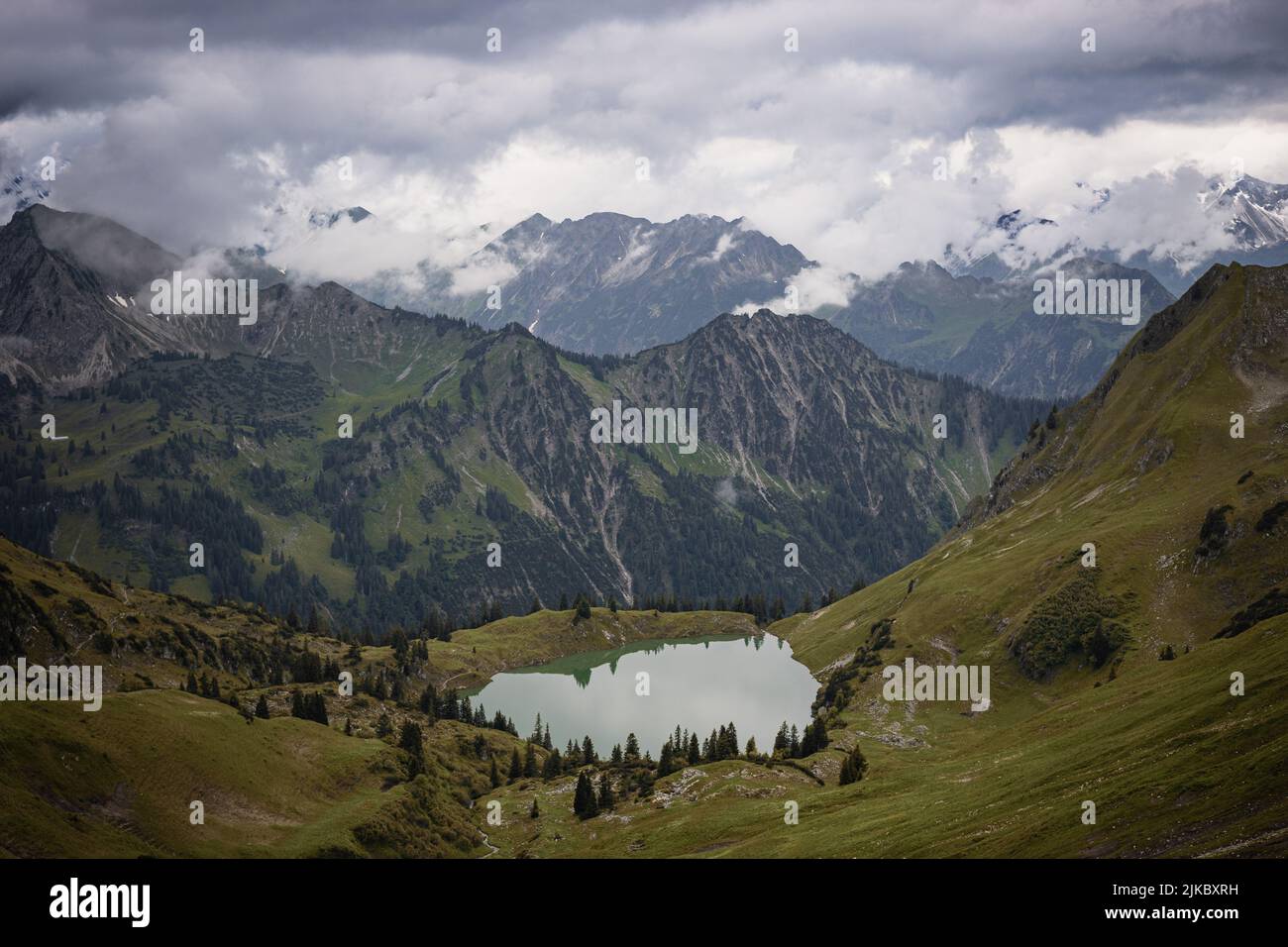 The Alpsee lake near the base of the Nebelhorn mountain in Allgau Alps ...