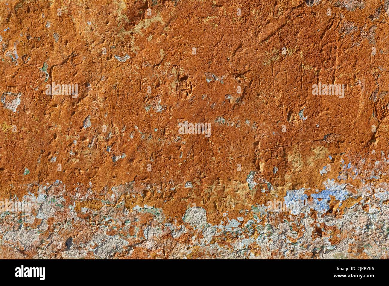 Texture of an old stone wall with rusty cracked plaster Stock Photo - Alamy