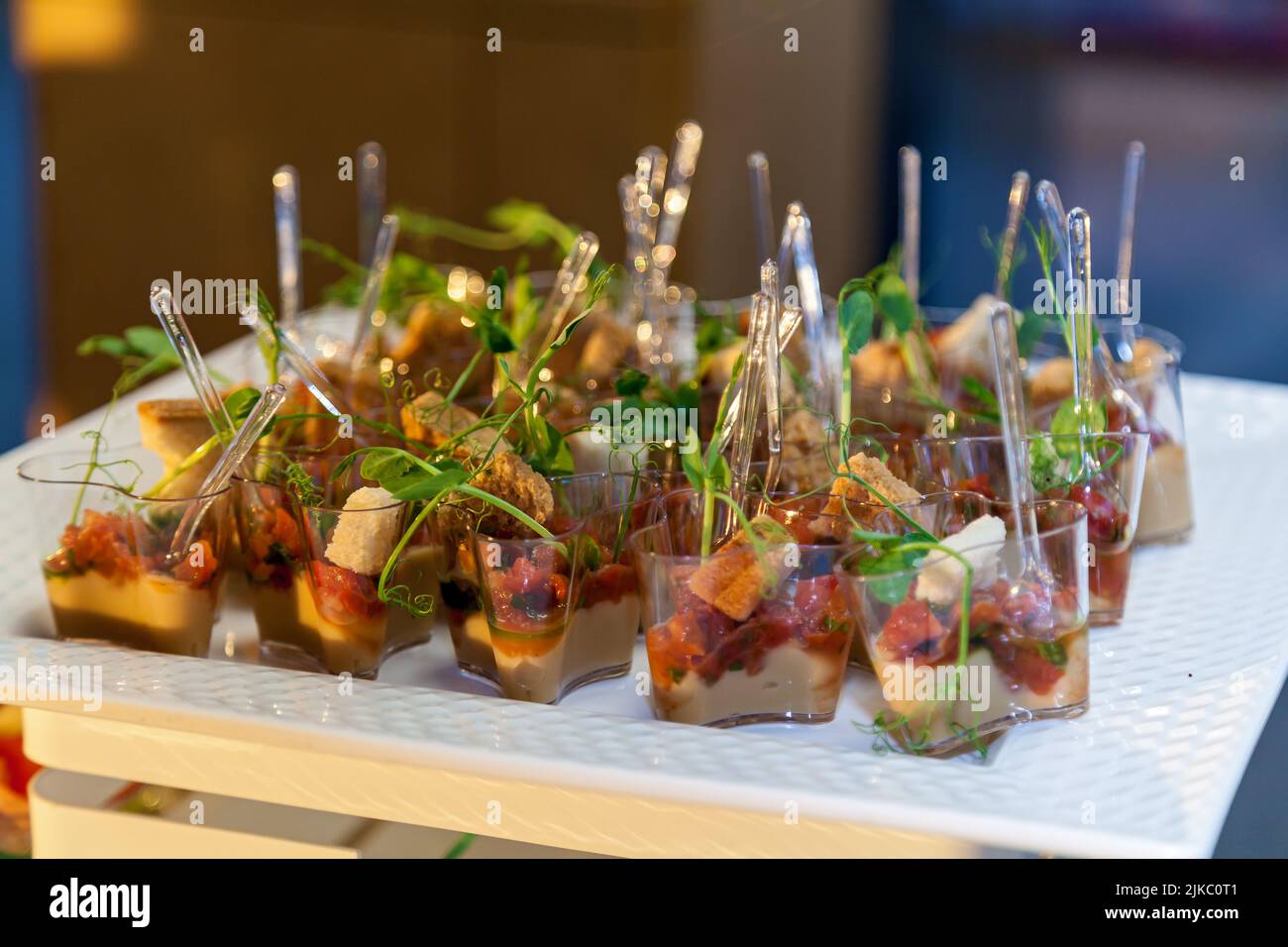 Catering service plate .appetizing sandwiches on plastic sticks ...