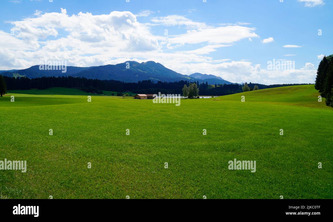 hiking trail overlooking scenic Attlesee in the Bavarian Alps ...