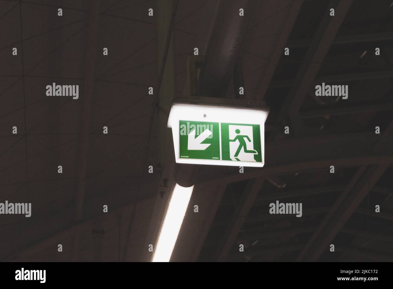 Exit sign hanging on ceiling hi-res stock photography and images - Alamy