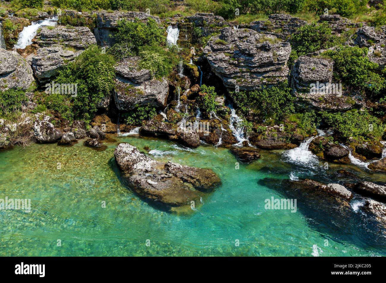 Big and fast river turning into waterfall in Podgorica. Landscapes ...