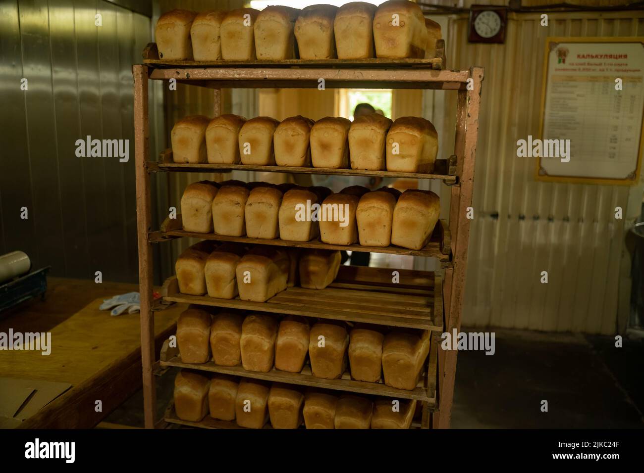 Shelves with fresh bread. Finished bread products to be shipped to ...