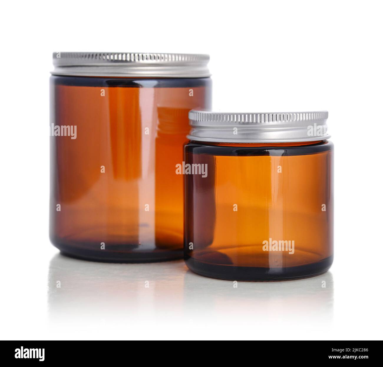 Brown empty cosmetic glass jars isolated on white background. Clipping ...