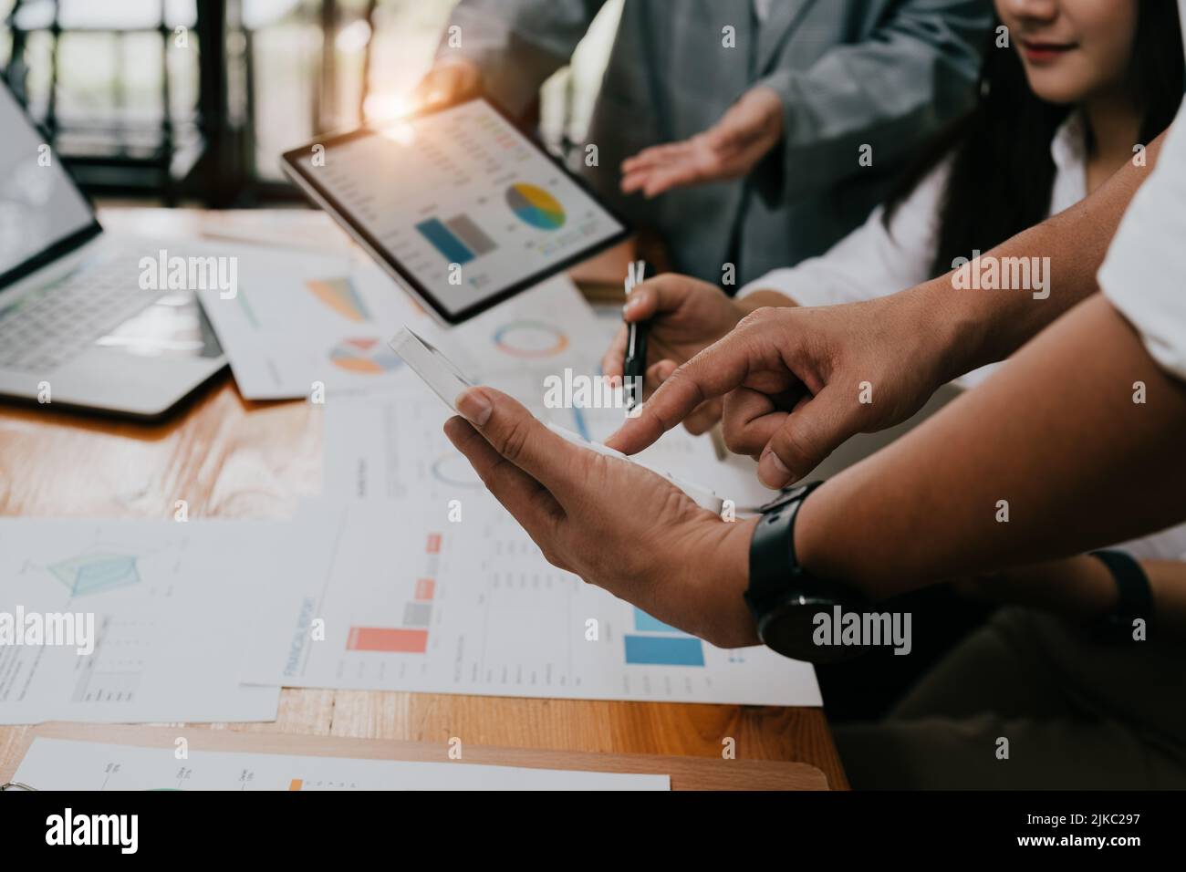 Team work discussing in valuation data in meeting room, Business people ...