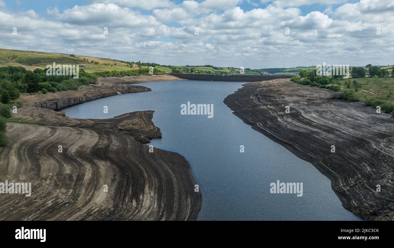 The reservoir banks are exposed as water is severally depleted at ...