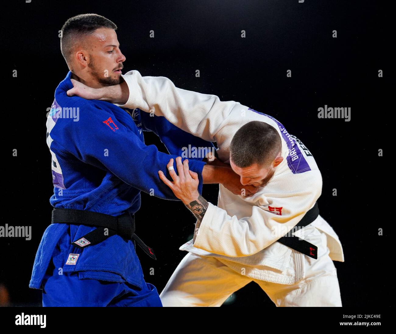 Scotland's David Ferguson takes on Wales' Daniel Rabbitt in the Mens 60 ...