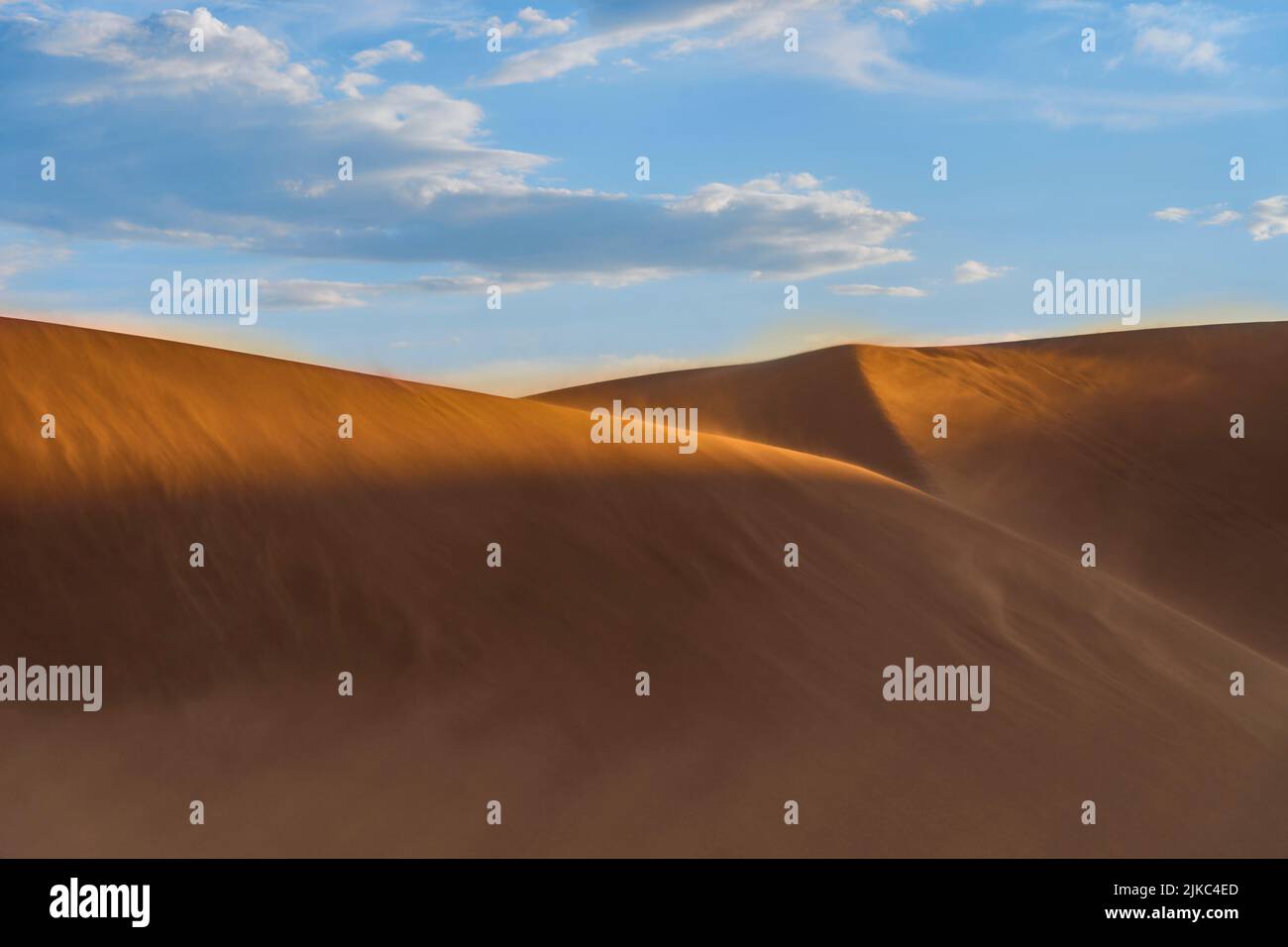 A beautiful landscape of sand dunes in a desert Stock Photo - Alamy