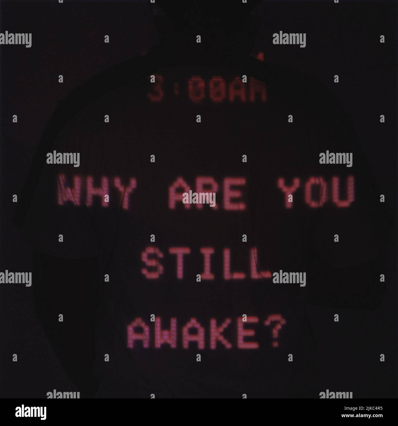 A projector photography with 'why are you still awake?' text in black ...