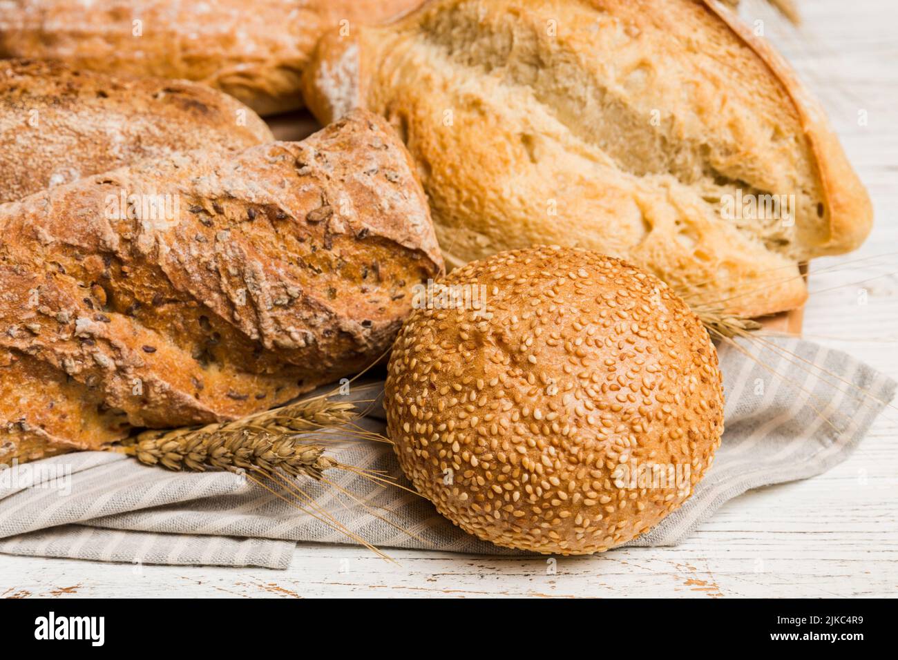 Homemade natural breads. Different kinds of fresh bread as background ...