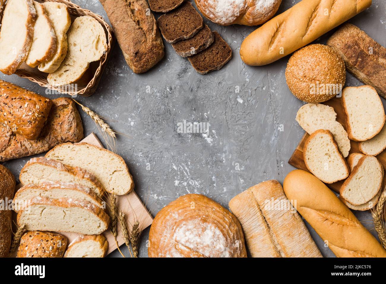 Homemade natural breads. Different kinds of fresh bread as background ...
