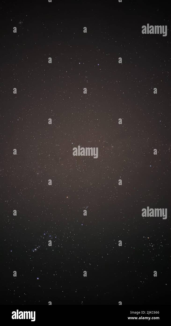 A vertical shot of many stars shining in the dark sky at night Stock ...