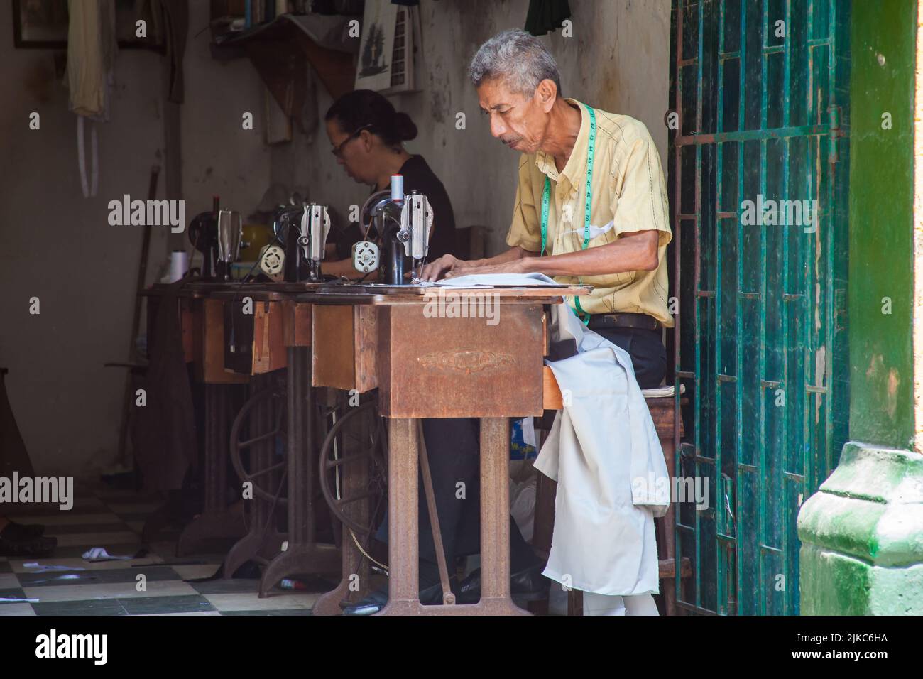 CARTAGENA DE INDIAS, COLOMBIA - AUGUST, 2011: Traditional dressmaker ...