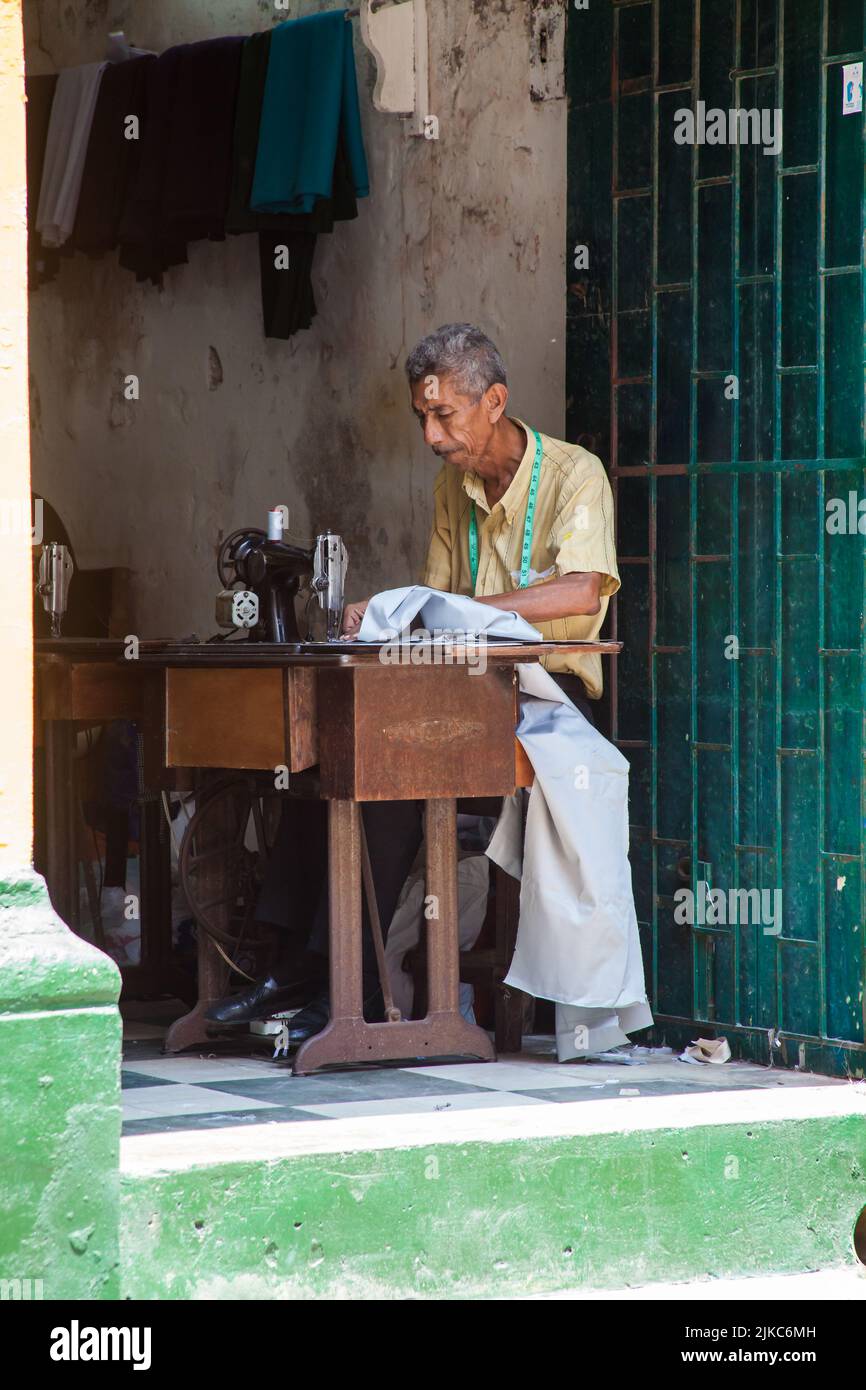 CARTAGENA DE INDIAS, COLOMBIA - AUGUST, 2011: Traditional dressmaker ...
