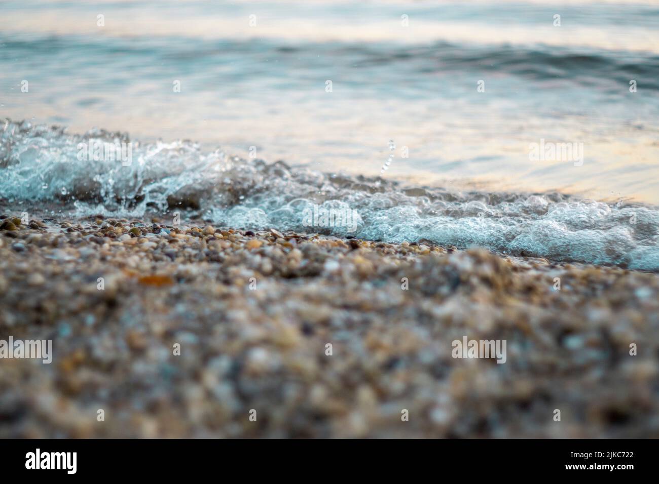 a closeup of a small sea wave Stock Photo - Alamy