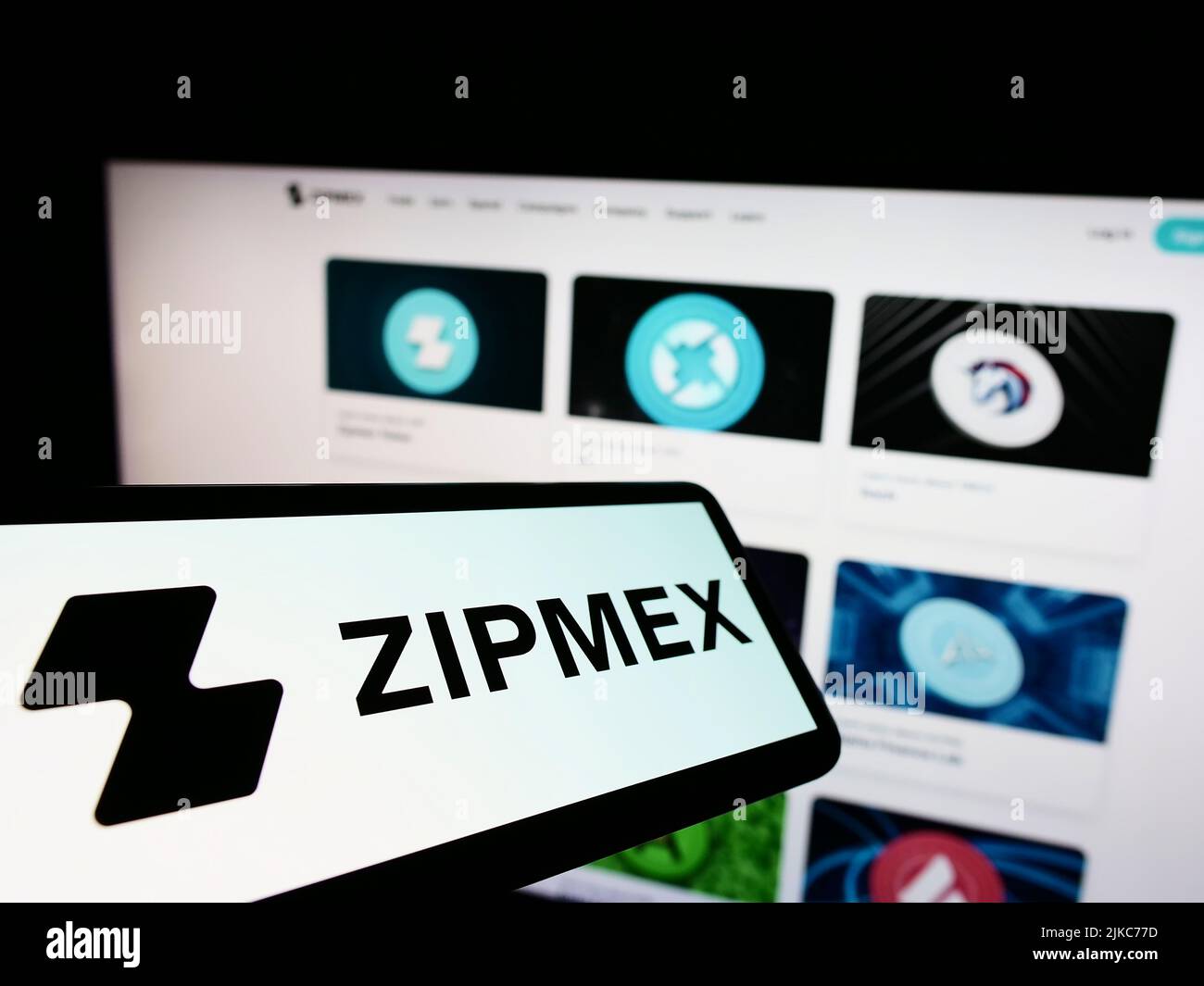 Cellphone with logo of Singaporean crypto company Zipmex Pte. Ltd. on screen in front of ...