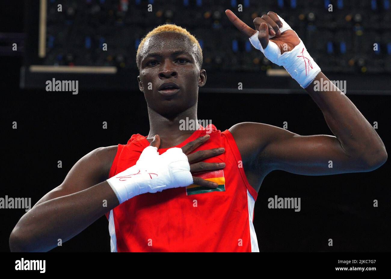 Joseph Commey (Red) from Ghana celebrates victory in the Men's Feather ...