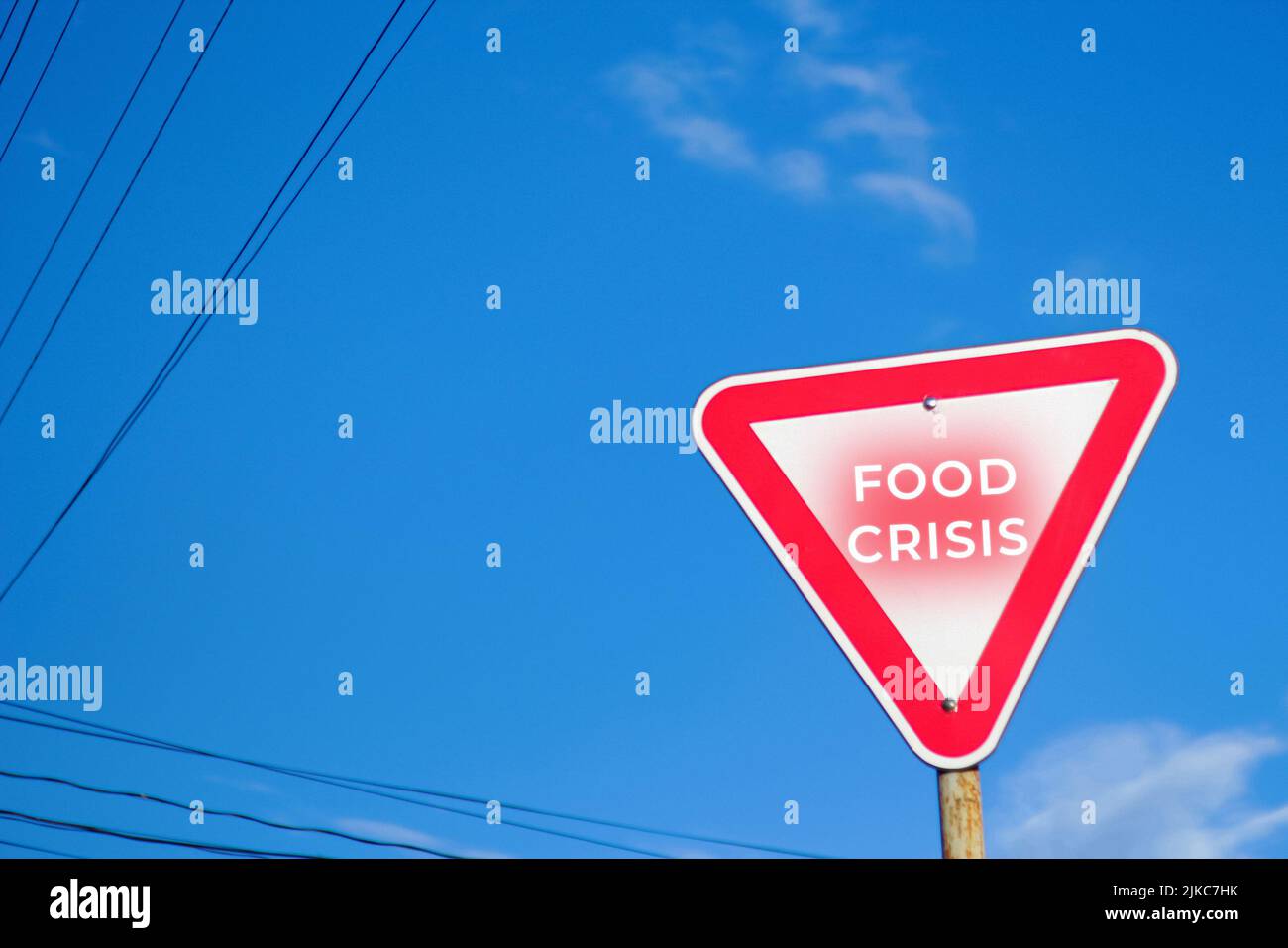 Food crisis concept. Red road sign. Defocus blank empty triangle red ...