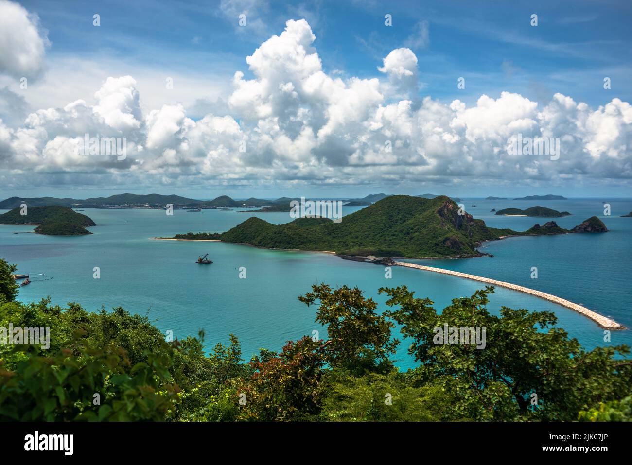 An aerial shot of a beautiful waterscape with islands vegetation and dense clouds in the ...
