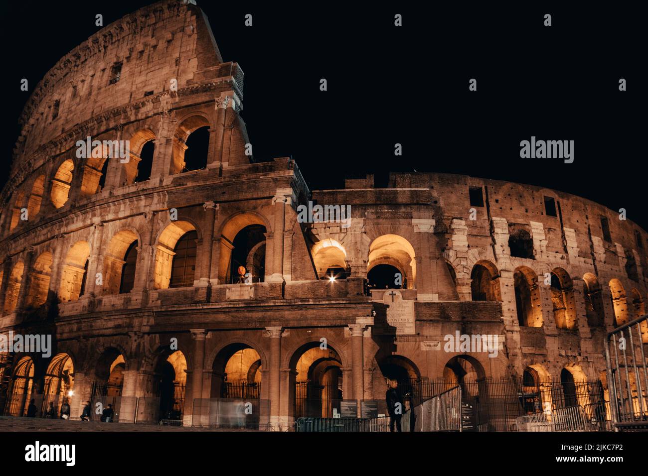 The view of the illuminated Colosseum at night in Italy Stock Photo - Alamy