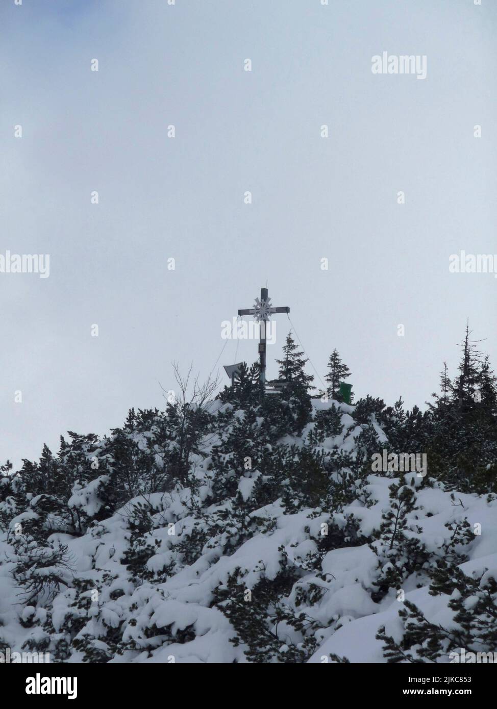 Summit cross Wank mountain in wintertime, Bavaria, Germany Stock Photo ...