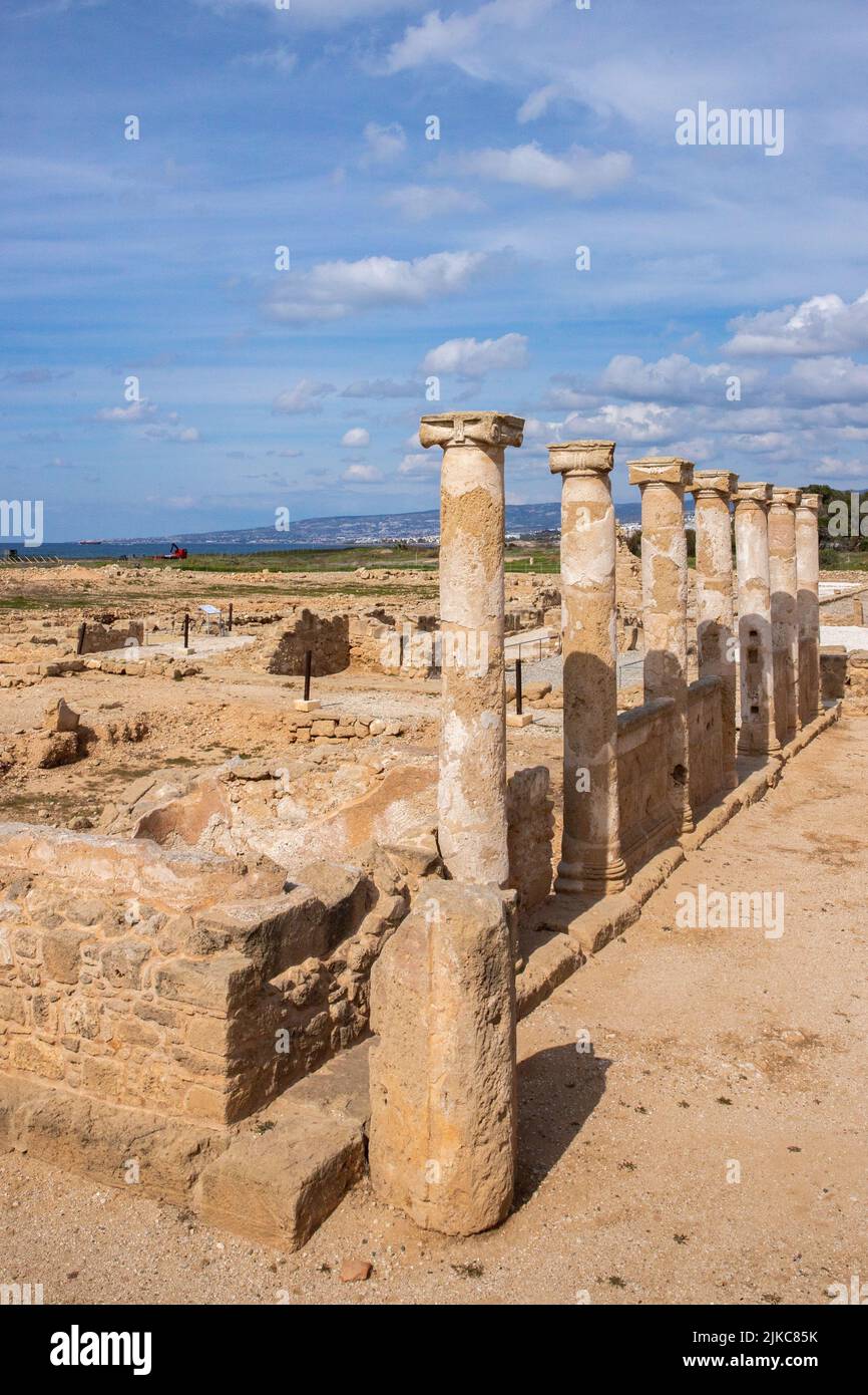A vertical shot of columns in the Paphos Archaeological Park in Cyprus ...