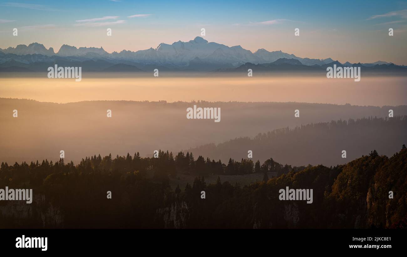 A magnificent panoramic view of landscape with layers of mountains ...