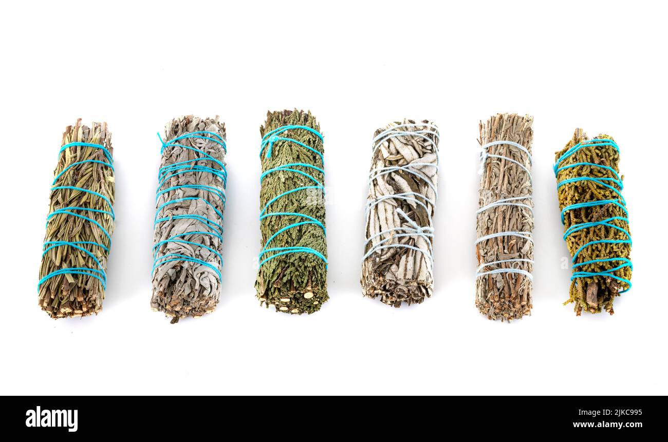 white sage incense group, in front of white background Stock Photo - Alamy