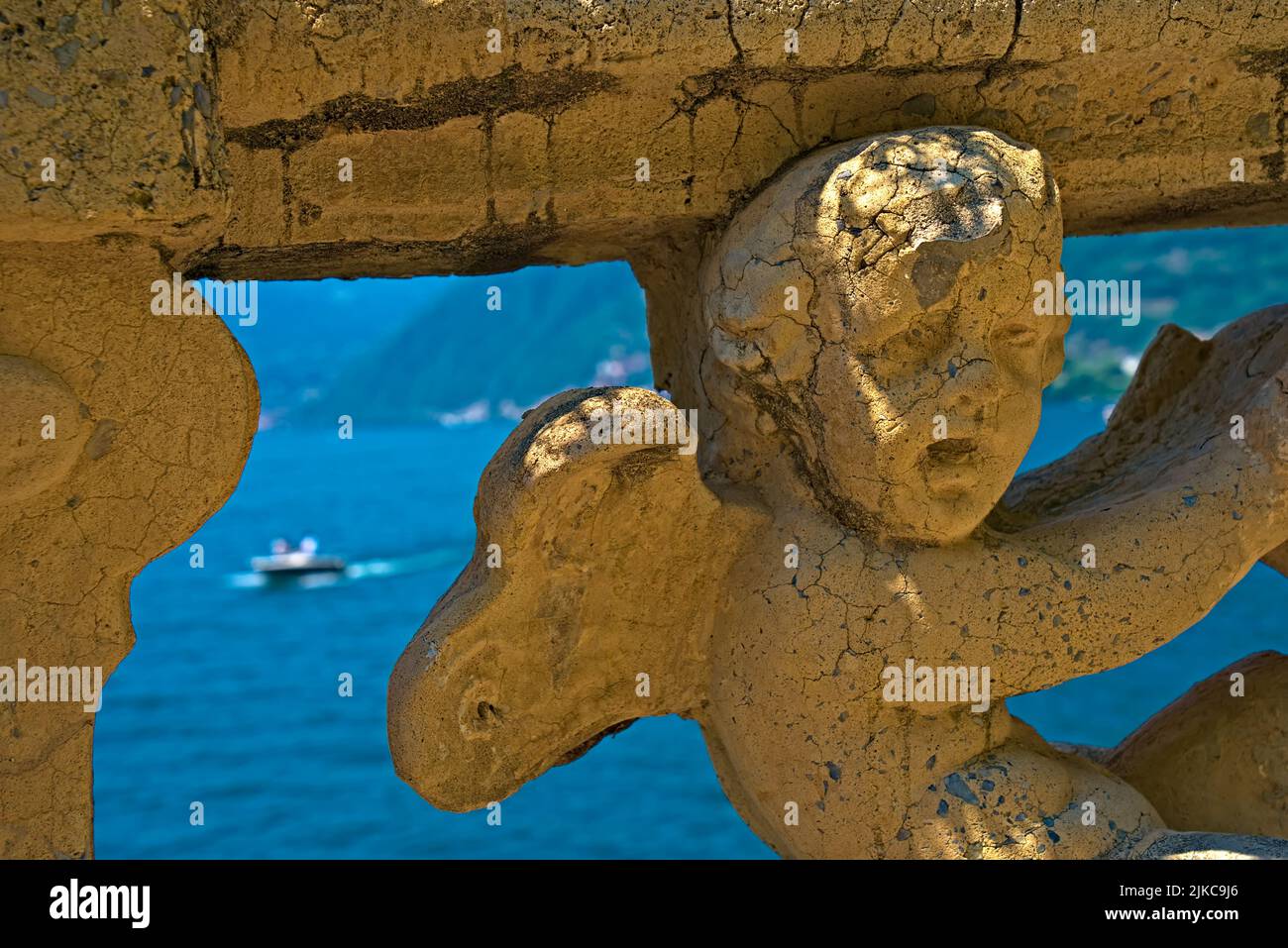 Stone parapet with decorations depicting evocative Renaissance putto ...