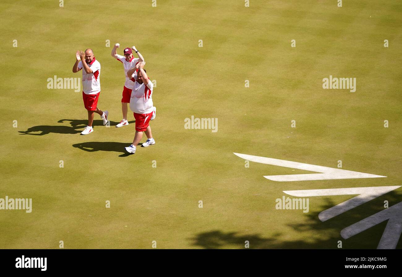 England's Nick Brett, Louis Ridout and Jamie Chestney celebrate winning ...