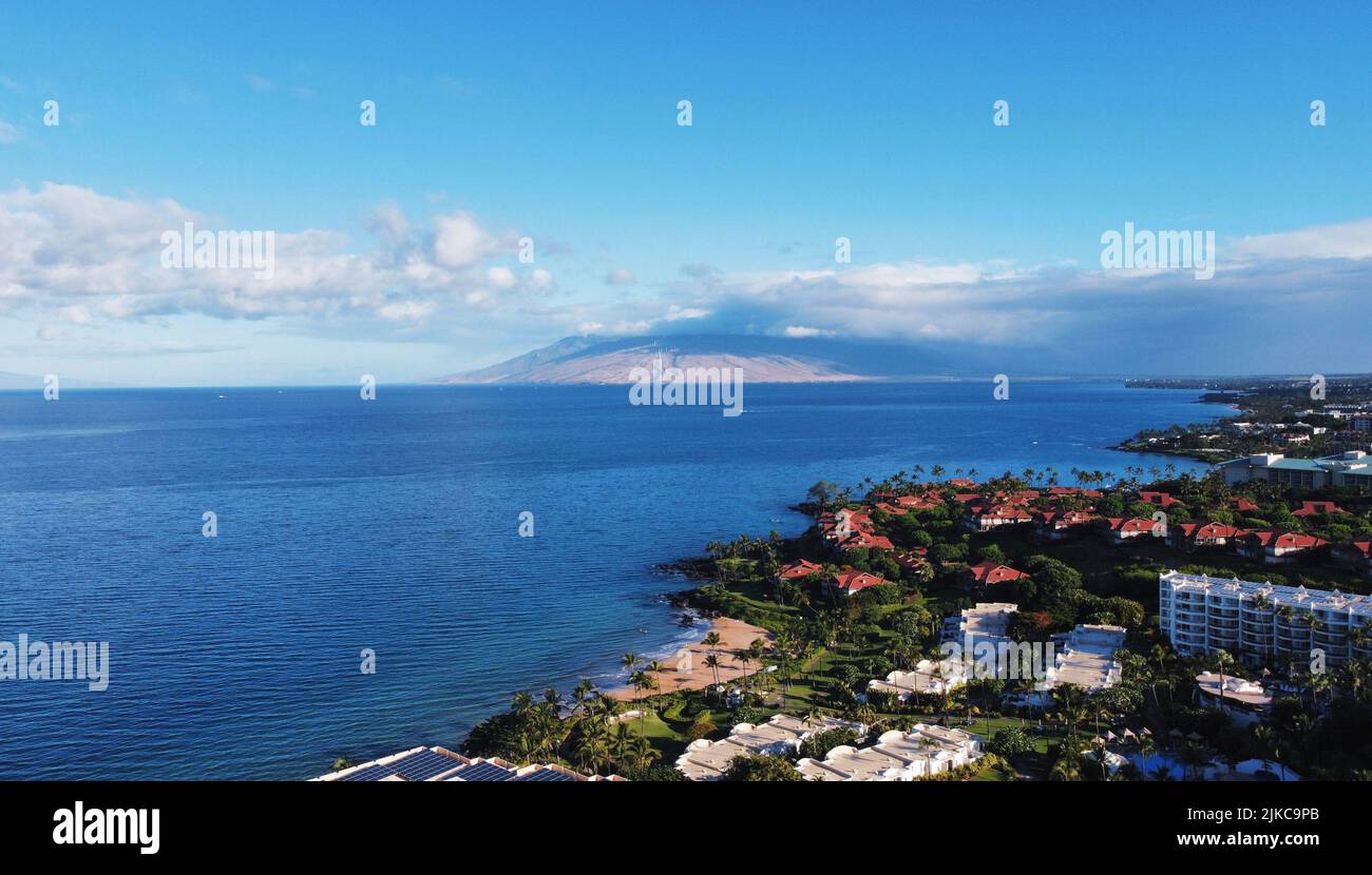 An aerial view of a coastal village in Maui, Hawaii during summer Stock ...