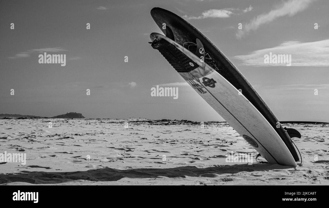 Surfboard stuck in sand beach hi-res stock photography and images - Alamy
