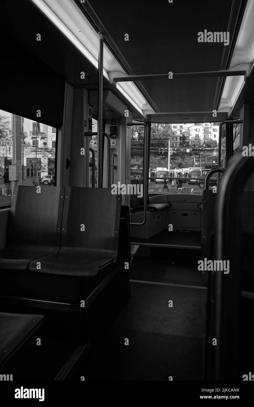 A vertical of an empty train shot in grayscale Stock Photo - Alamy