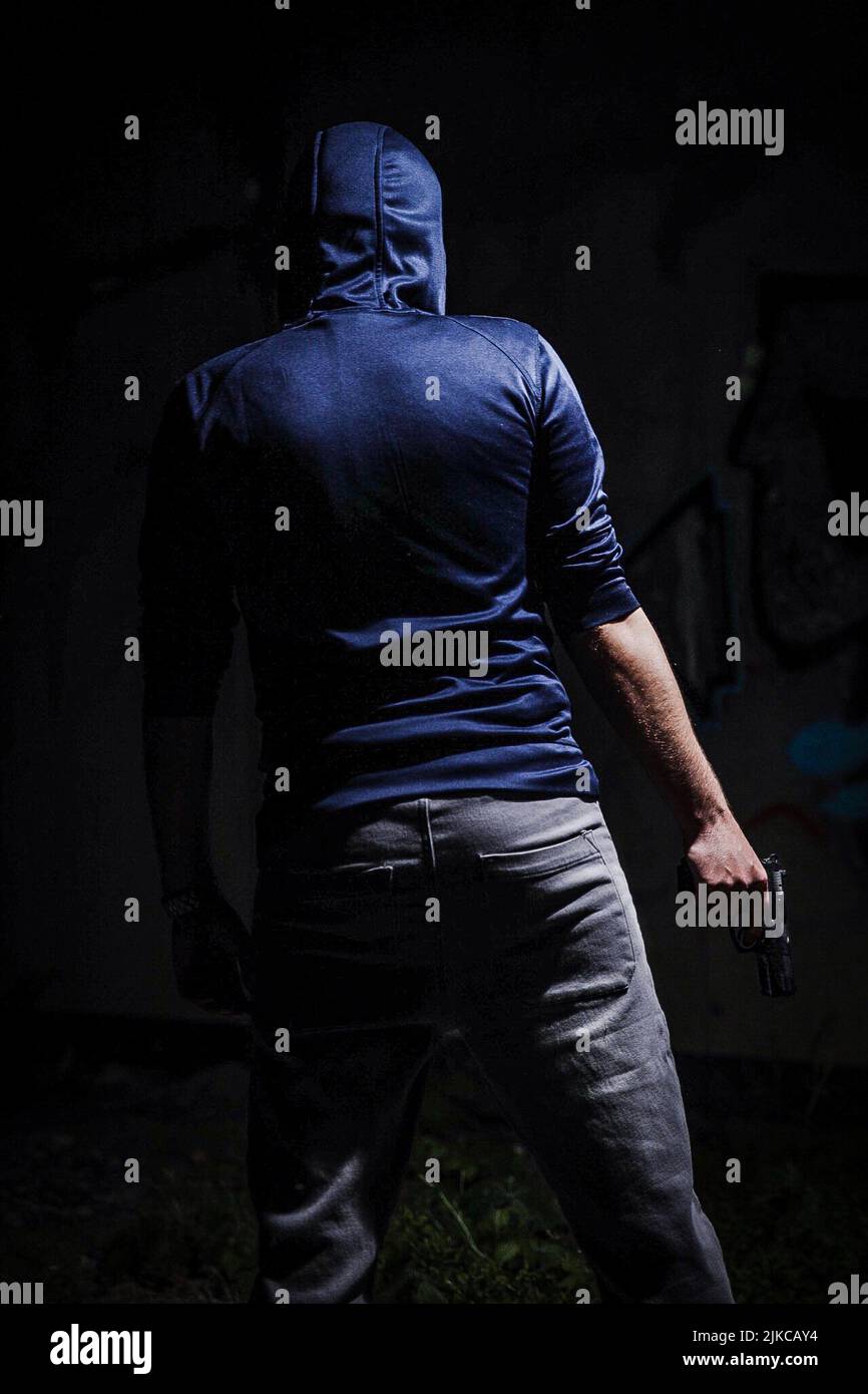 Vertical vertical vertical gun man hi-res stock photography and images ...