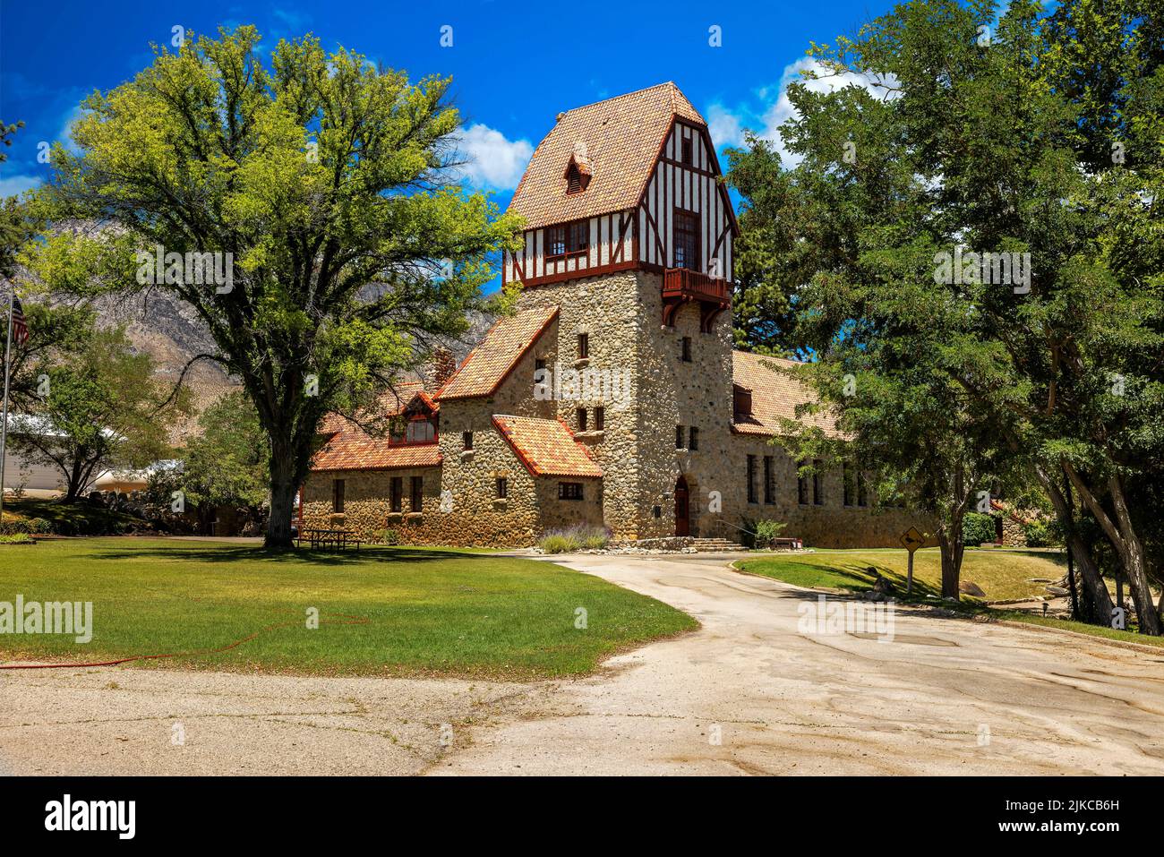 The Mount Whitney Fish Hatchery surrounded by threes in a sunny day in ...